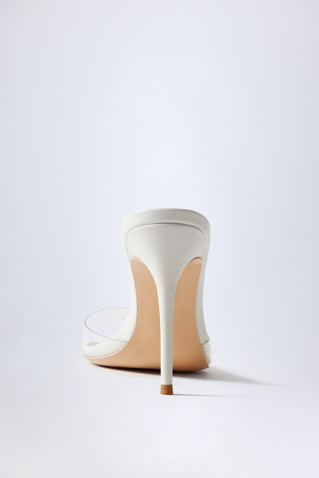 Almond-Toe Heeled Mules in Transparent PVC | Oh Polly