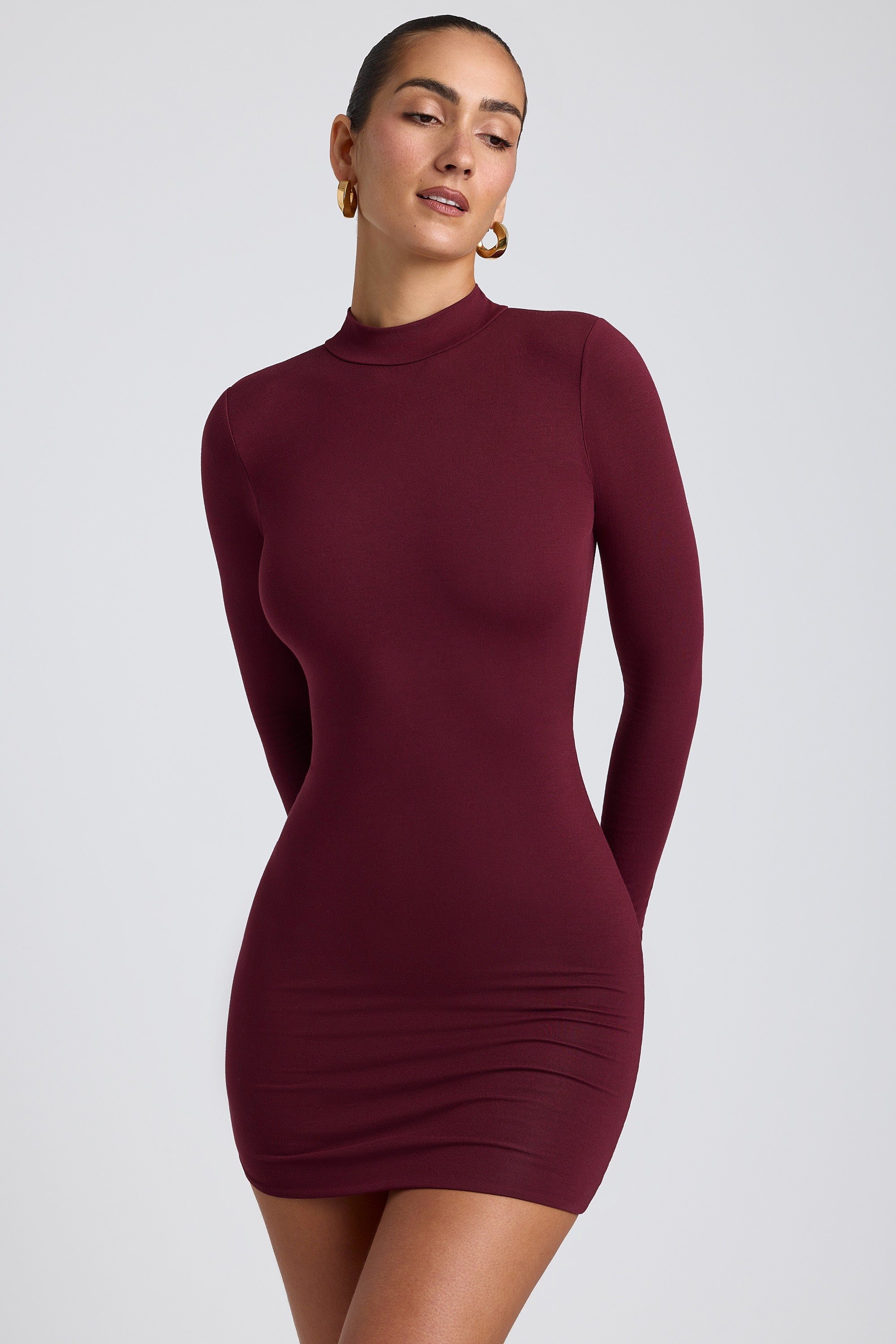 Yara Open-Back Long-Sleeve Mini Dress in Plum | Oh Polly