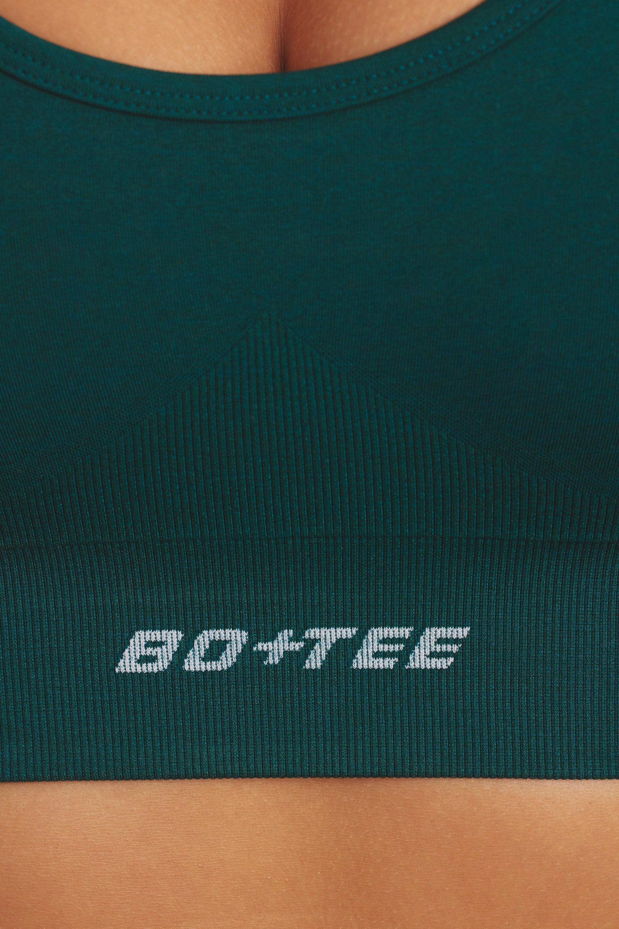 Focused Halter Neck Define Luxe Sports Bra in Jade Green | Oh Polly