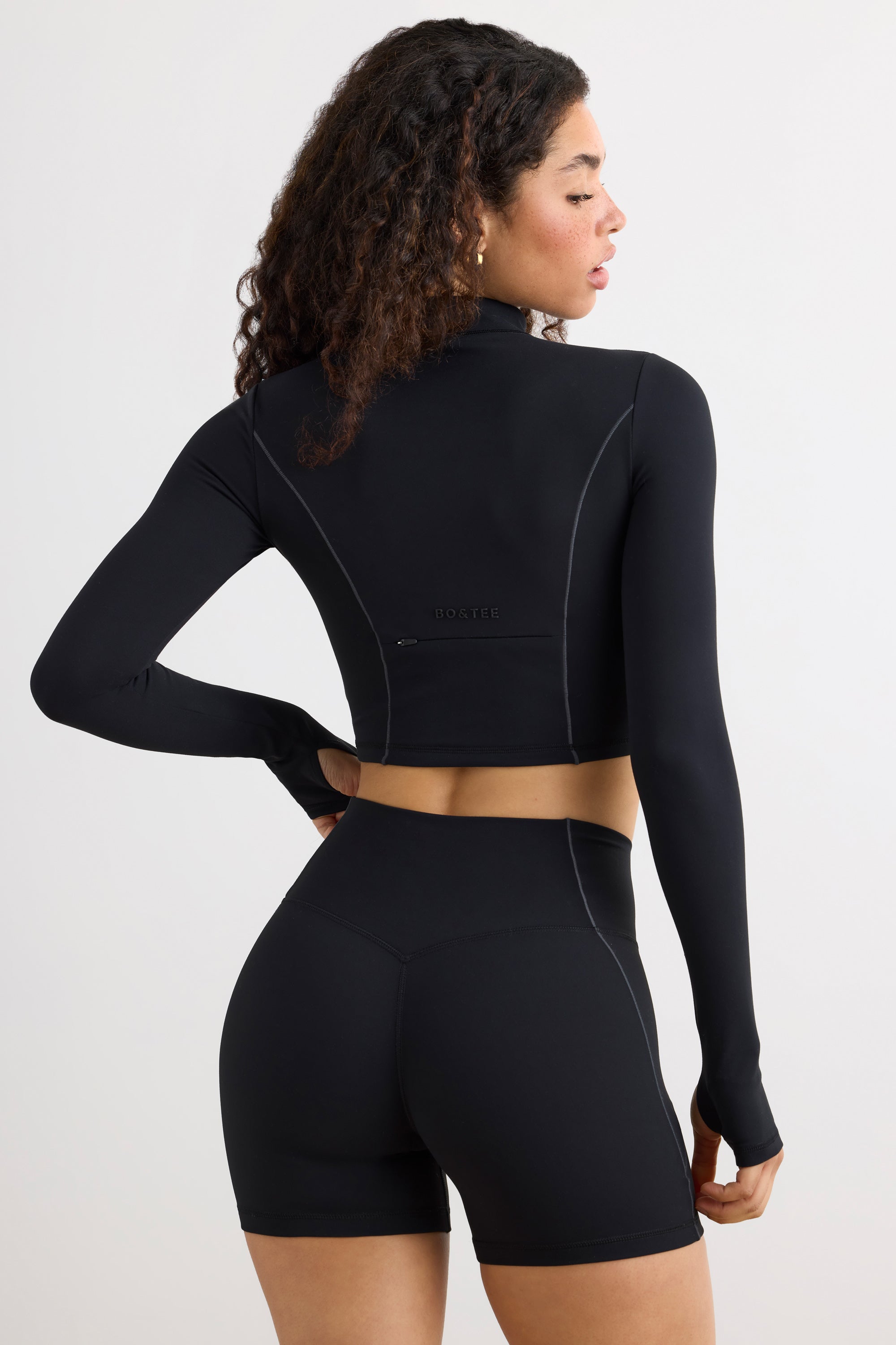 Soft Active High Waist Mini Shorts in Black | Oh Polly