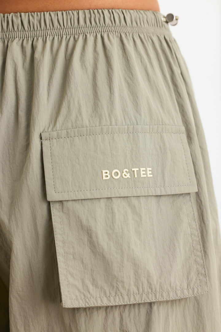 Convertible Wide Leg Track Pants in Mineral | Bo&Tee – Oh Polly UK