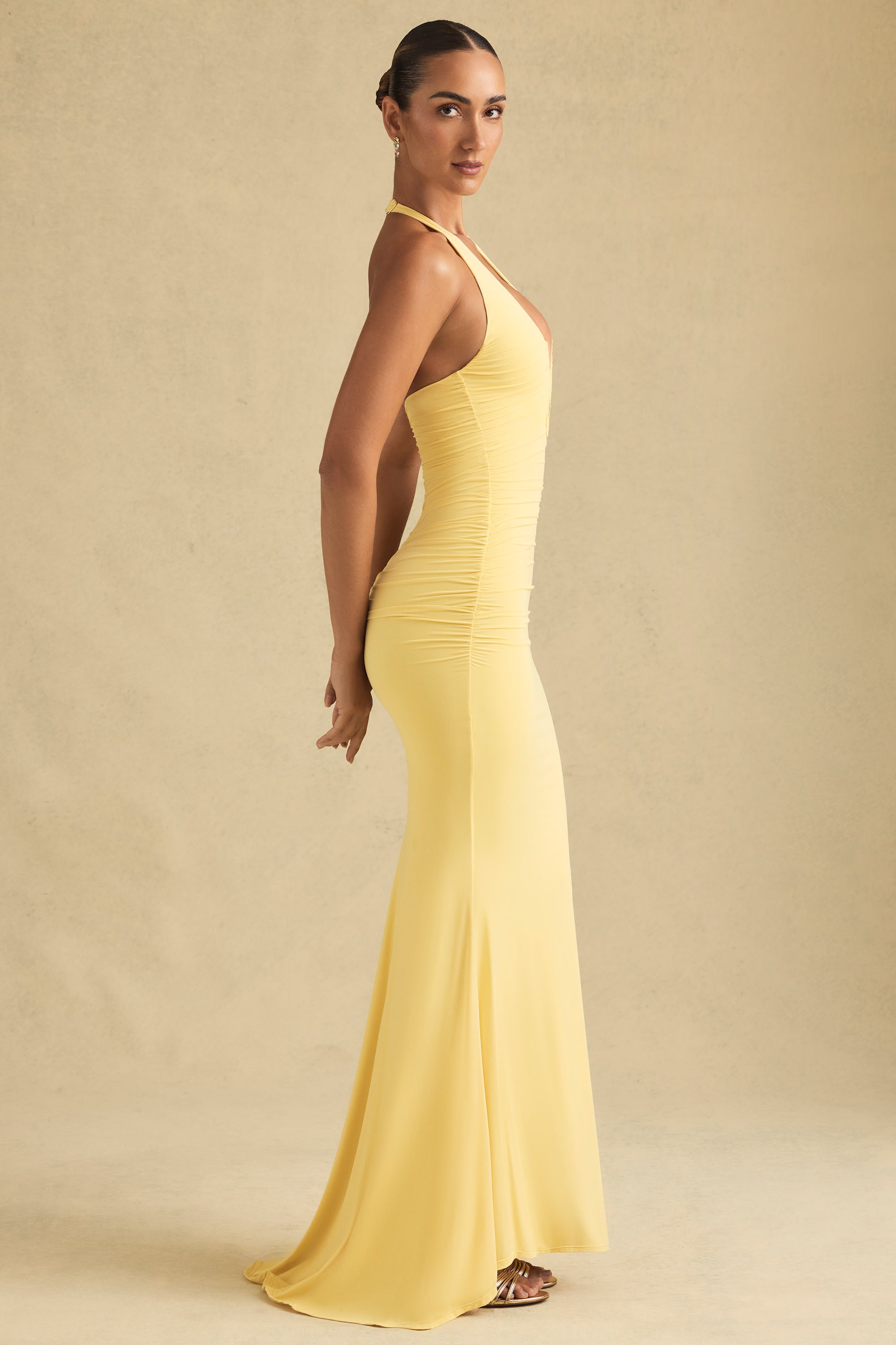 Laverna Ruched Backless Halterneck Gown in Pastel Yellow | Oh Polly